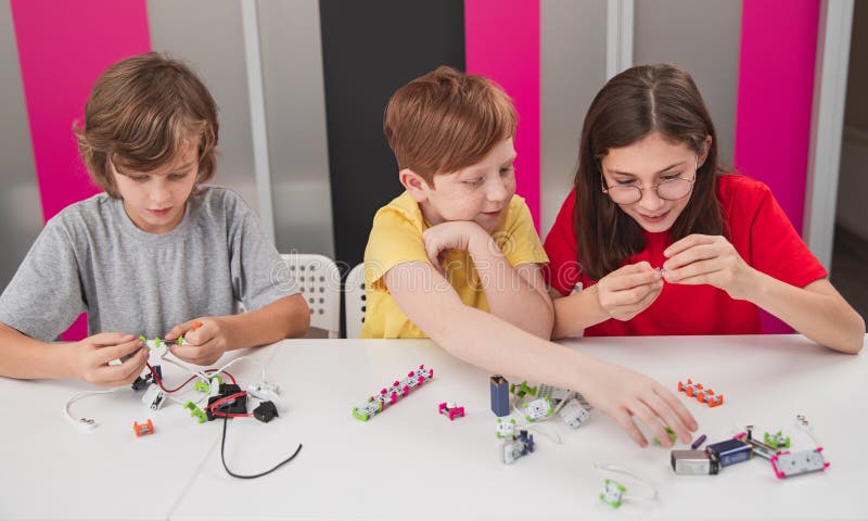 Schoolkids Making Robots in Classroom Stock Image - Image of childhood ...