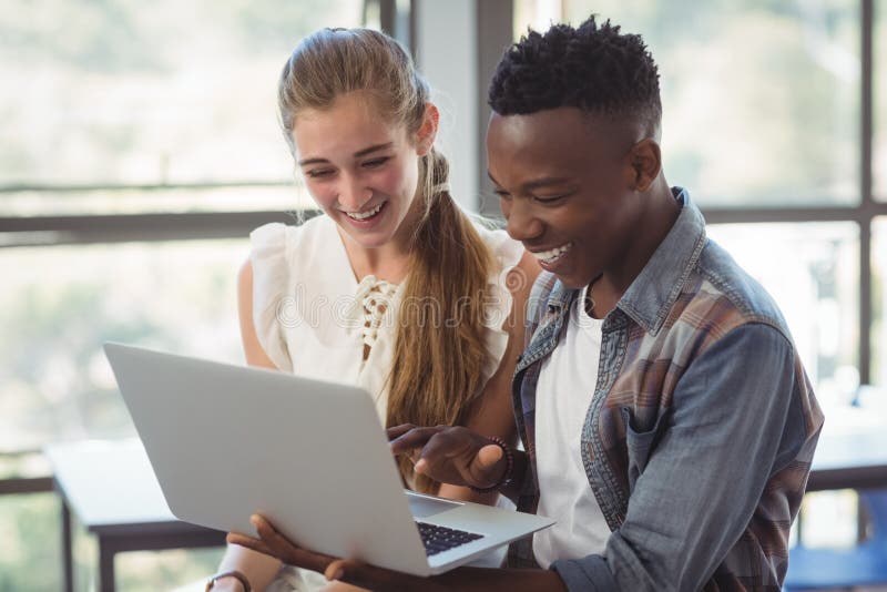Schoolkids Using Laptop in Classroom Stock Photo - Image of development ...