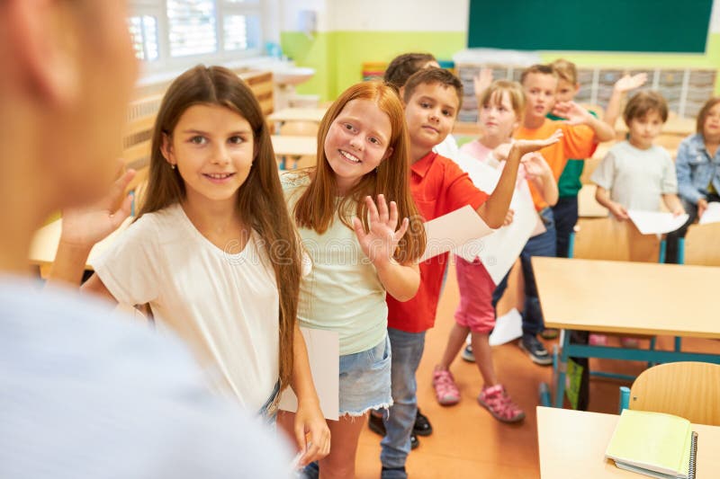 Schoolkids Waving at Female Teacher Stock Photo - Image of choir ...