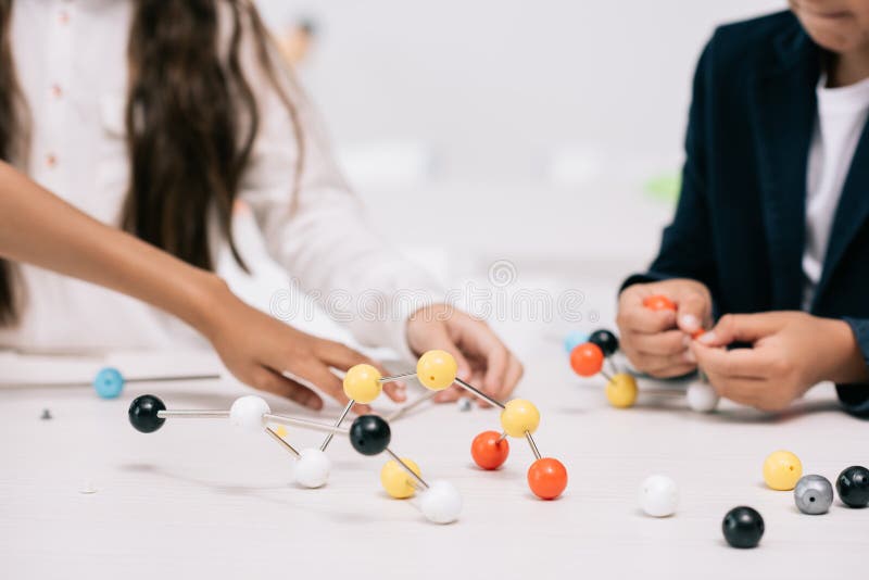 Schoolkids Working with Molecular Model at Chemistry Lesson Stock Photo ...