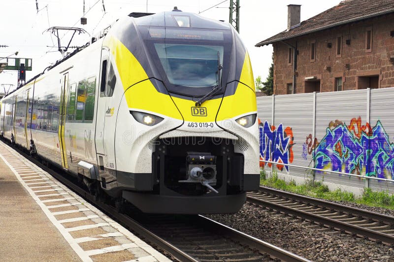 Arrival of an Electric Train at the Railway Station. Editorial Stock ...