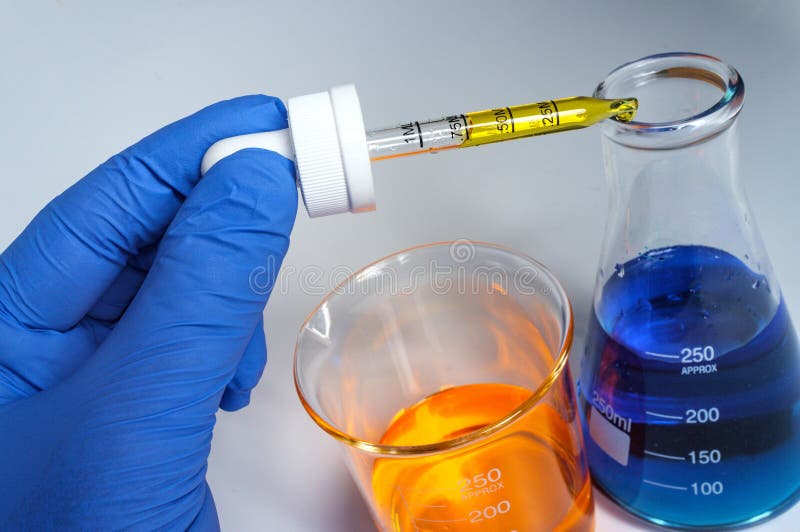 Science Beaker Experiment stock image. Image of pipet - 203610603