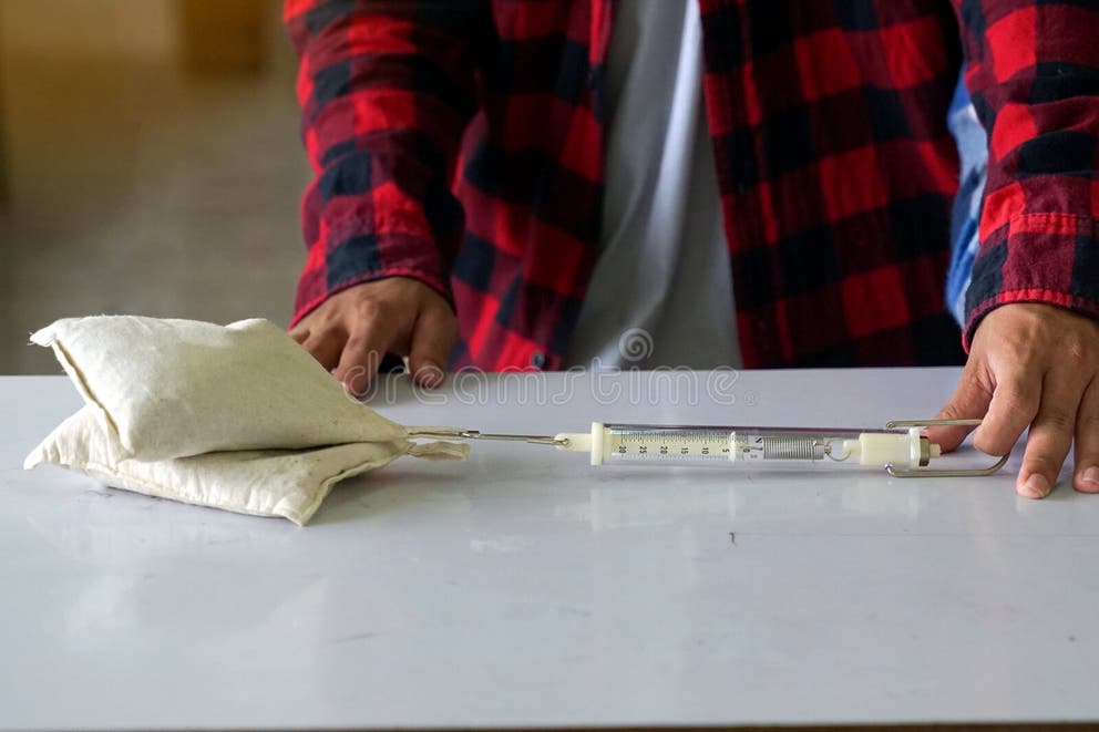 Science Classroom, Students are Performing a Physics Experiment on the ...