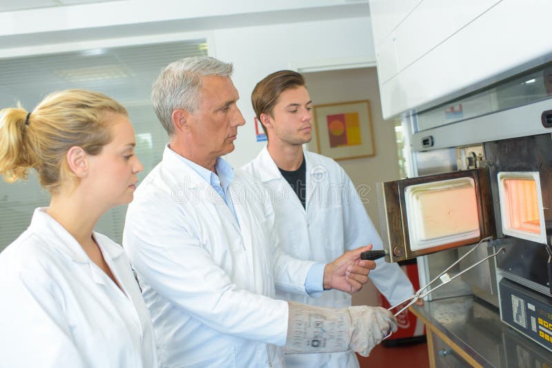 Science development in lab stock photo. Image of handsome - 321914432