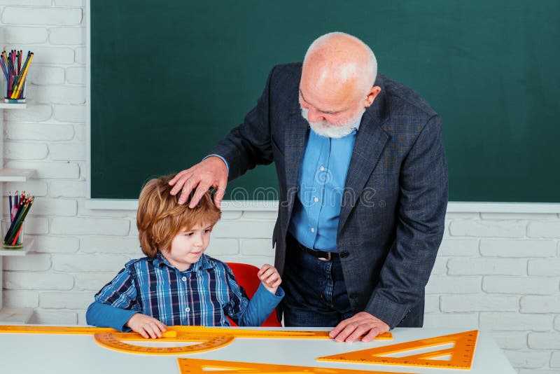 Science Education Concept. Elementary School Teacher Giving Female ...