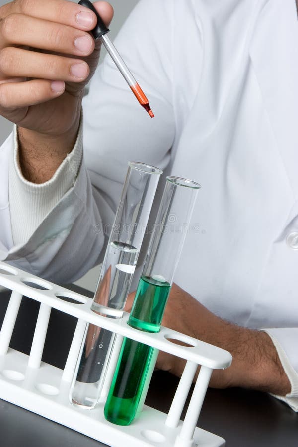 Science Experiment stock image. Image of green, vial, orange - 9500181