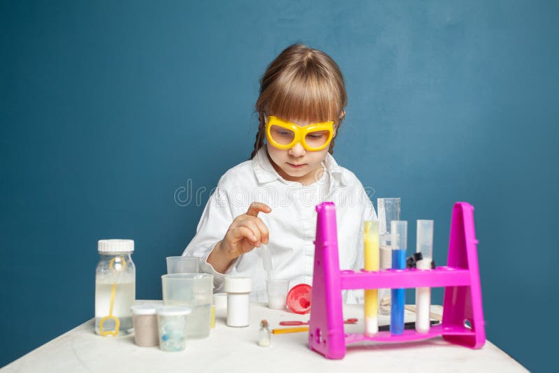 Science Experiment. Elementary School Student Indoors in Science ...