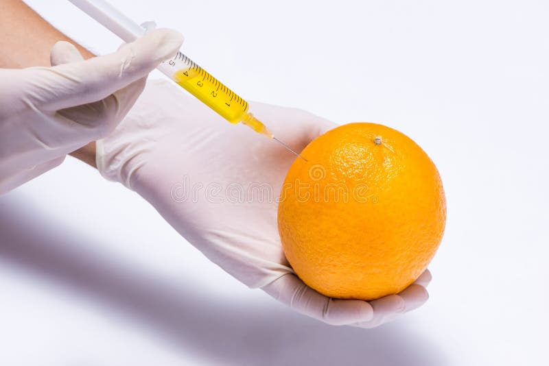 Science Experiment with Orange and Syringe on White. Stock Photo ...