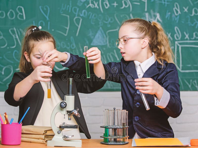 Science Experiments in Laboratory. Chemistry Research. Children Using ...
