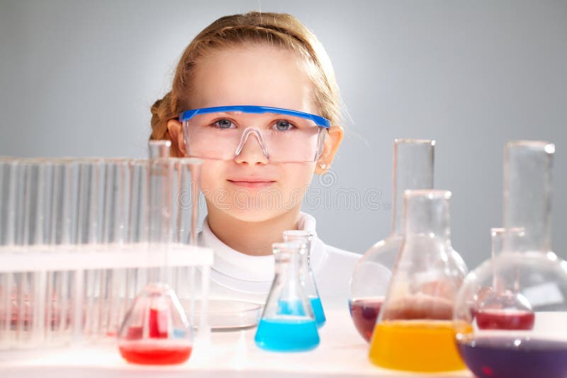 Pupils Carrying Out Experiment in Science Class Stock Photo - Image of ...