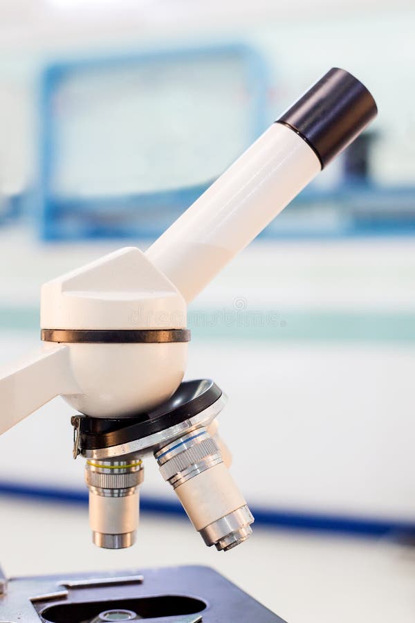 In a Science Lab with a Microscope Stock Photo - Image of business ...