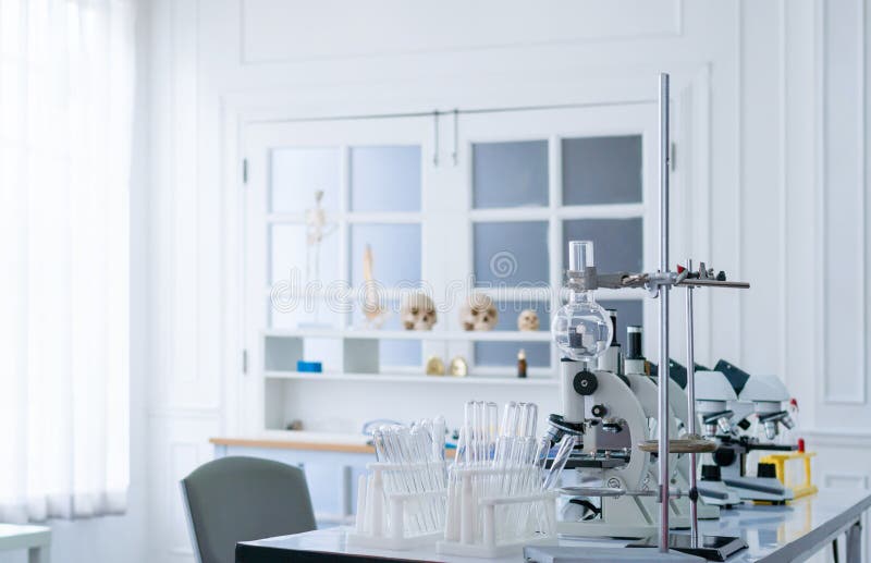 Science Laboratory, Microscope and Test Tubes on the Working Table ...