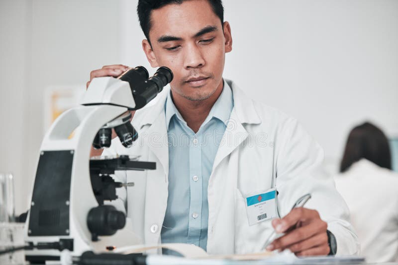 Science, Microscope and Man Writing Data, Test Results and Research ... Science, Microscope and Man Writing Data, Test Results and Research ...
