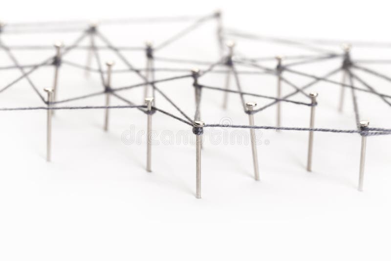 A Large Grid of Pins Connected with String. Communication, NetwA Large ...