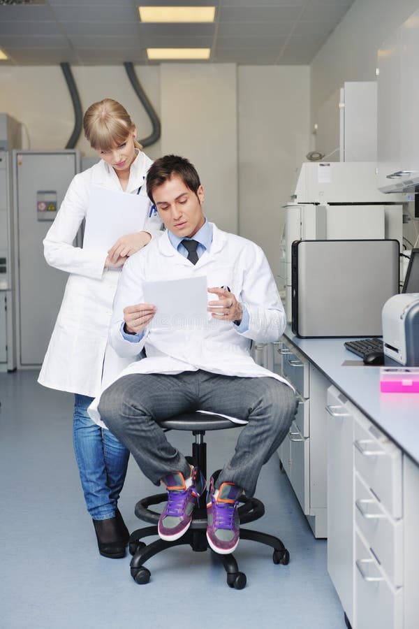 Science People in Bright Lab Stock Photo - Image of science, equipment ...