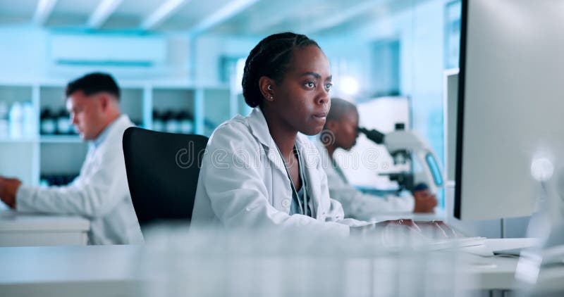 Science, Research and Black Woman at Computer Checking Results for ...