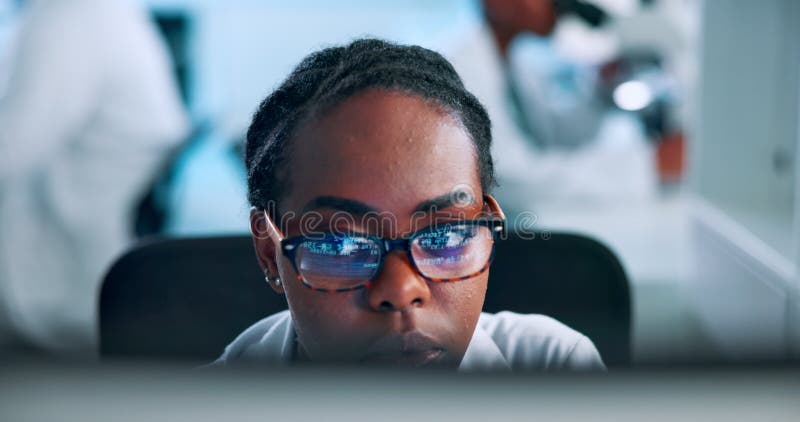 Science, Research and Black Woman at Computer Reading Results in ...