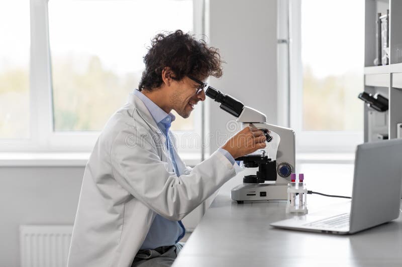 Scientist with Microscope Working in Laboratory Stock Image - Image of ...