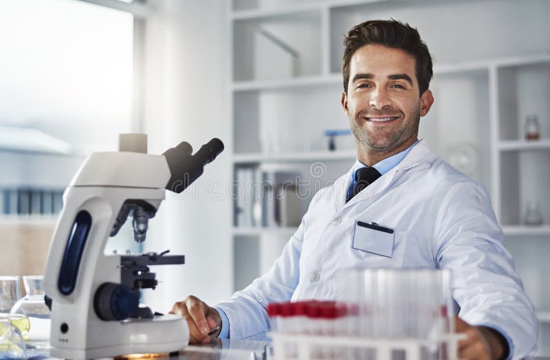 Science Simply Fascinates Me. Portrait of a Scientist Working in a Lab ...