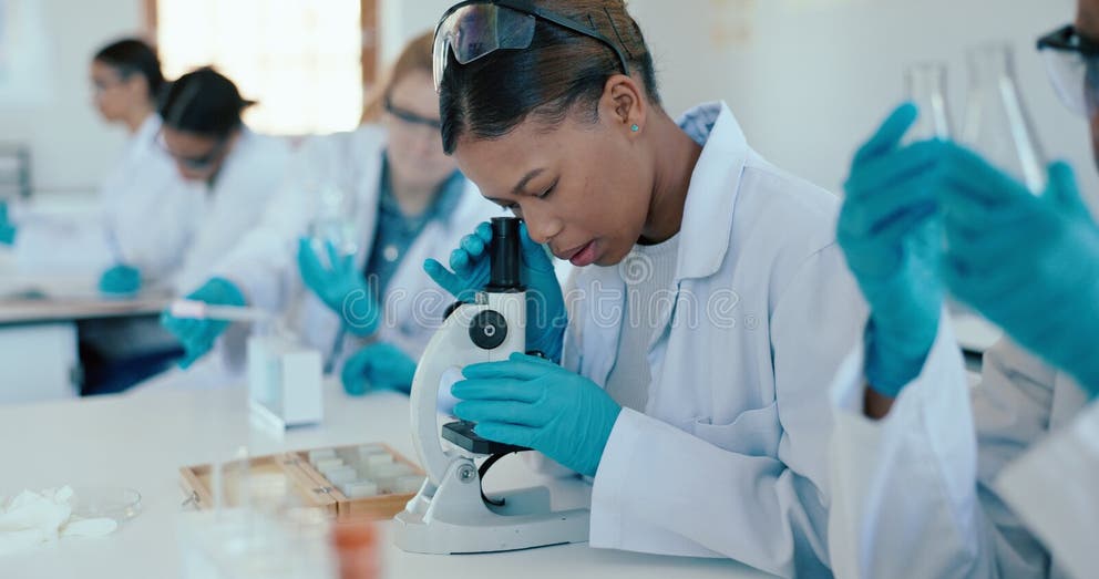 Science, Student and Analysis with Microscope in Classroom for Sample ...