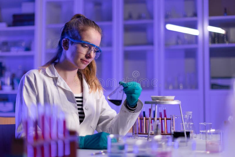 Science Student Doing Chemical Experiment in the Laboratory at ...