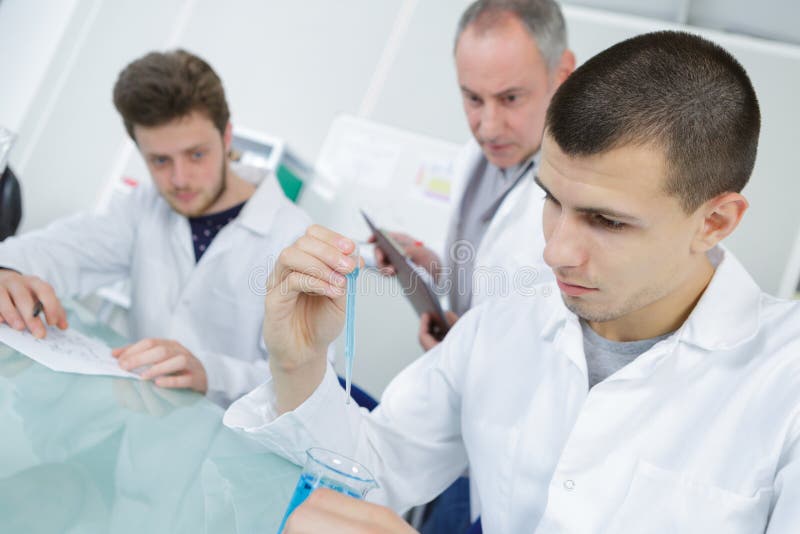 Science Students Doing Research Stock Photo - Image of youth, particle ...