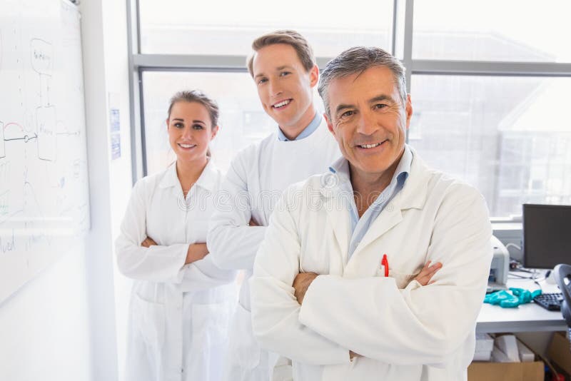 Science Students and Lecturer Smiling at Camera Stock Photo - Image of ...