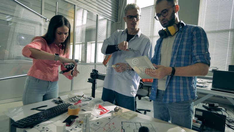 Science Students are Observing Bionic Tools in a Laboratory. Teamwork ...