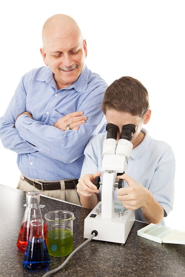 Science Teacher and Student Stock Image - Image of class, examining ...
