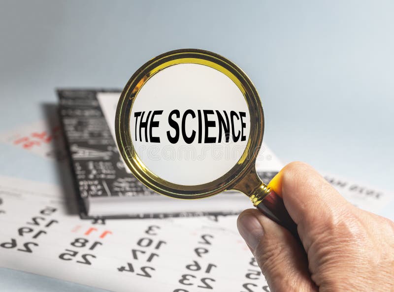 Science Word through Magnifier with Calendar and Book Stock Image ...