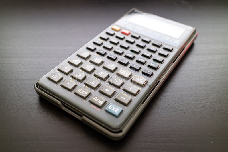 Scientific Calculator On Black Surface Background Stock Image - Image ...