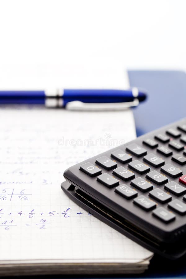 Scientific Calculator on the Maths Workbook with Blue Pen Stock Photo ...