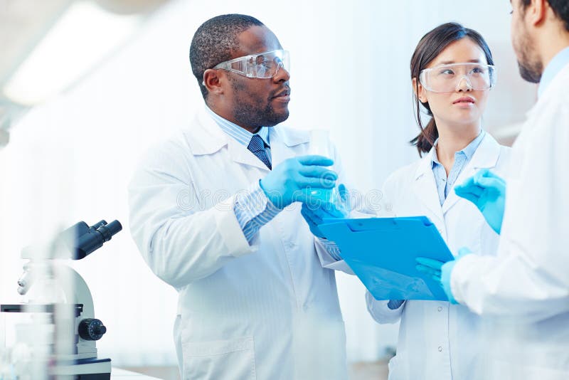 Scientific discussion stock image. Image of chemistry - 67252887