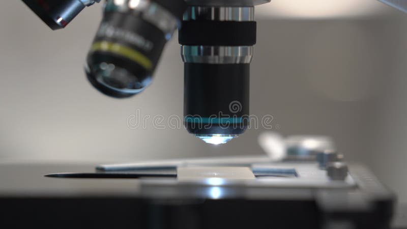 Microscope in Laboratory. Microscope with Metal Lens at Laboratory ...