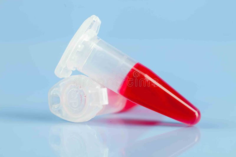 Scientific Experiment in Laboratory with Blue Background Stock Image ...