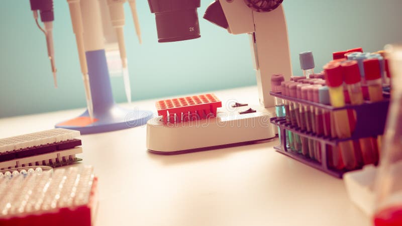 Scientific Experiment in Microbiological Lab. Microscope and Test Tube ...