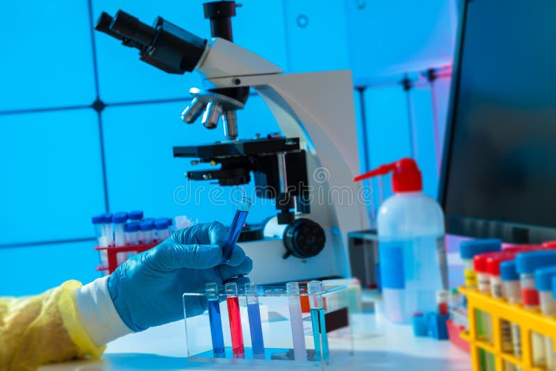 Scientific Experiment in Microbiological Lab. Microscope and Test Tube ...