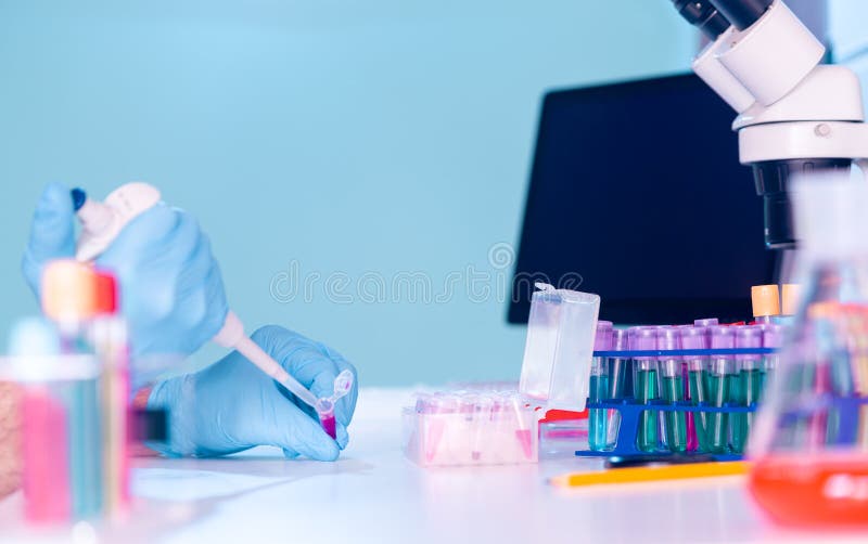 Scientific Experiment in Microbiological Lab. Microscope and Test Tube ...