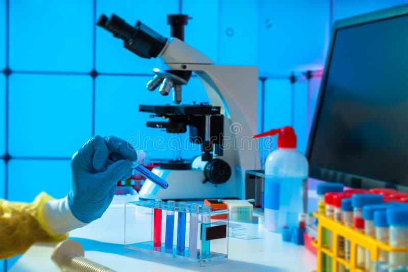Scientific Experiment in Microbiological Lab. Microscope and Test Tube ...