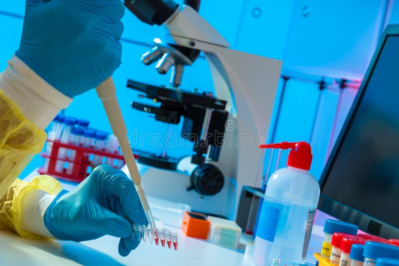 Scientific Experiment in Microbiological Lab. Microscope and Test Tube ...