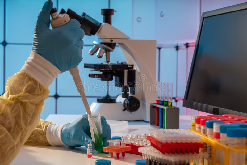 Scientific Experiment in Microbiological Lab. Microscope and Test Tube ...