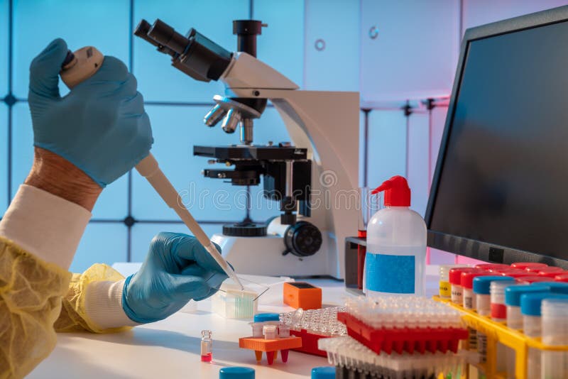 Scientific Experiment in Microbiological Lab. Microscope and Test Tube ...