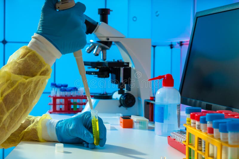 Scientific Experiment in Microbiological Lab. Microscope and Test Tube ...