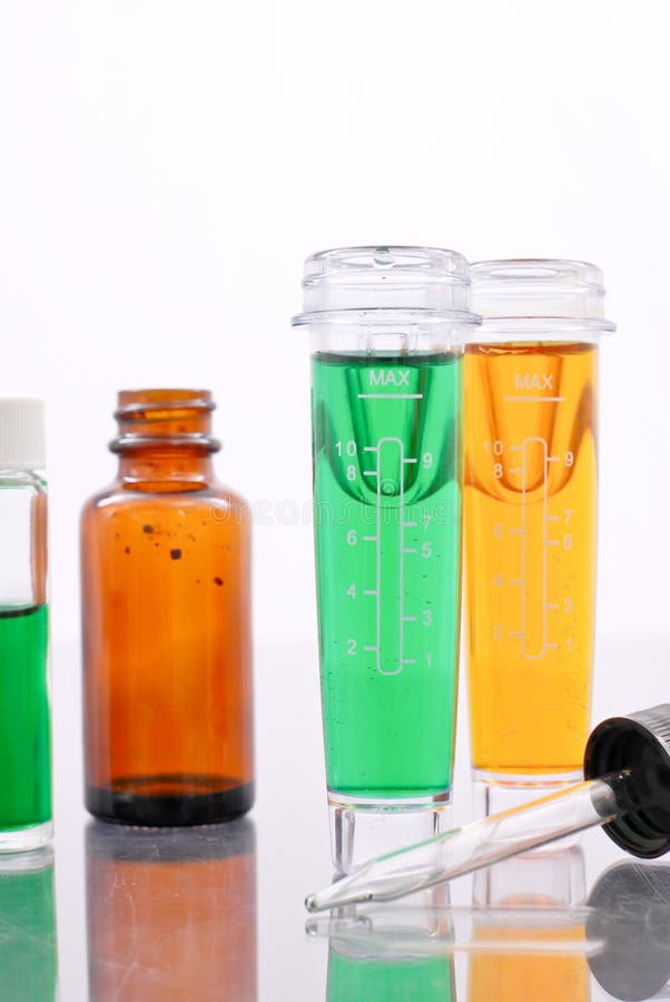 Concept of Branding. Cyan and Orange Flasks Stock Image - Image of ...