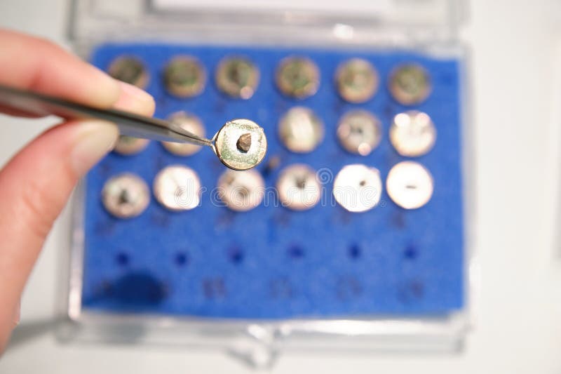 Scanning Electron Microscope Samples on Specimen Mounts, Tweezers and a ...