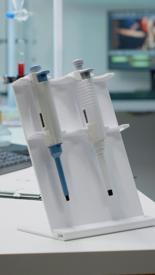 Scientific Micropipette and Microscope in Laboratory Stock Image ...