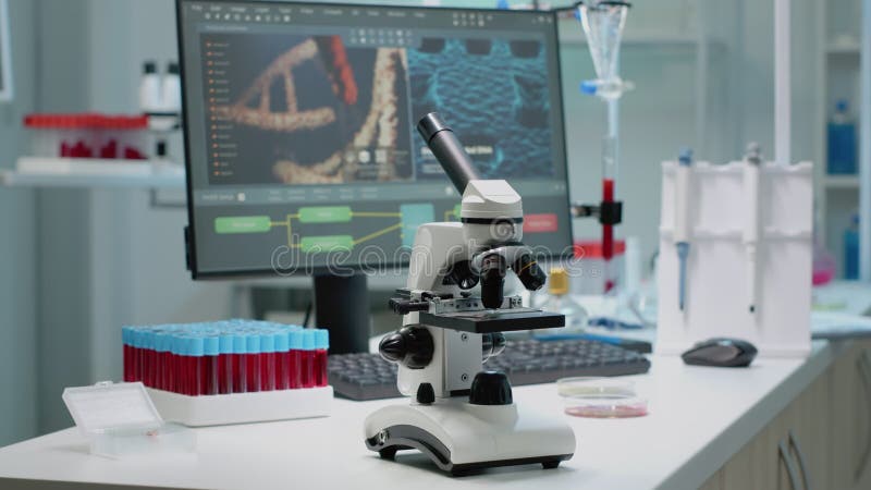 Scientific Microscope on Laboratory Desk with Researching Instruments ...