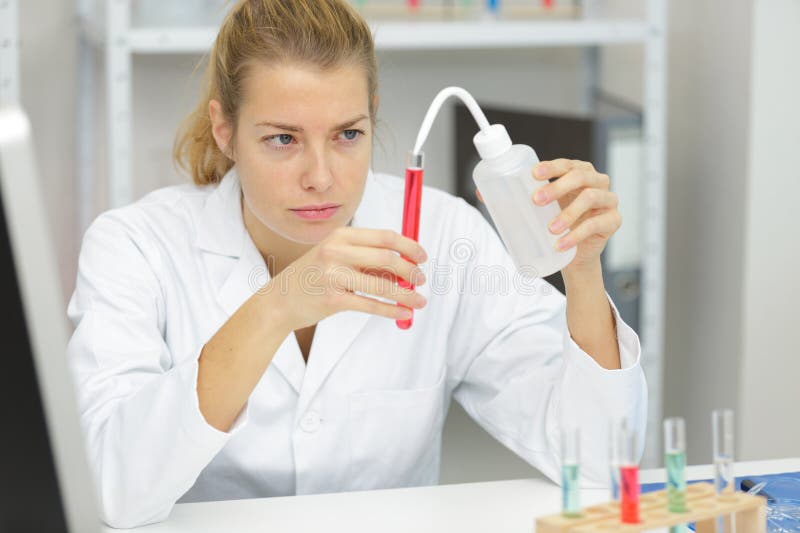 Scientific Researcher Holding at Liquid Solution in Lab Stock Image ...