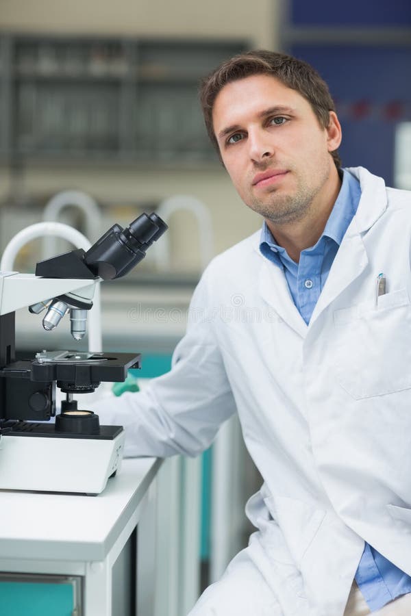 Scientific Researcher with Microscope in the Laboratory Stock Photo ...