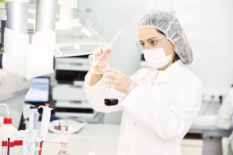 Pharmaceutical Researcher with Friability and Abrasion Tester in ...